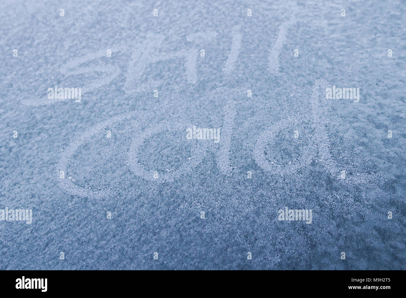 Writing on frozen windscreen Stock Photo - Alamy