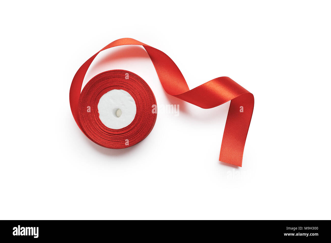 close up of a red ribbon isolated clipping mask on white background ...