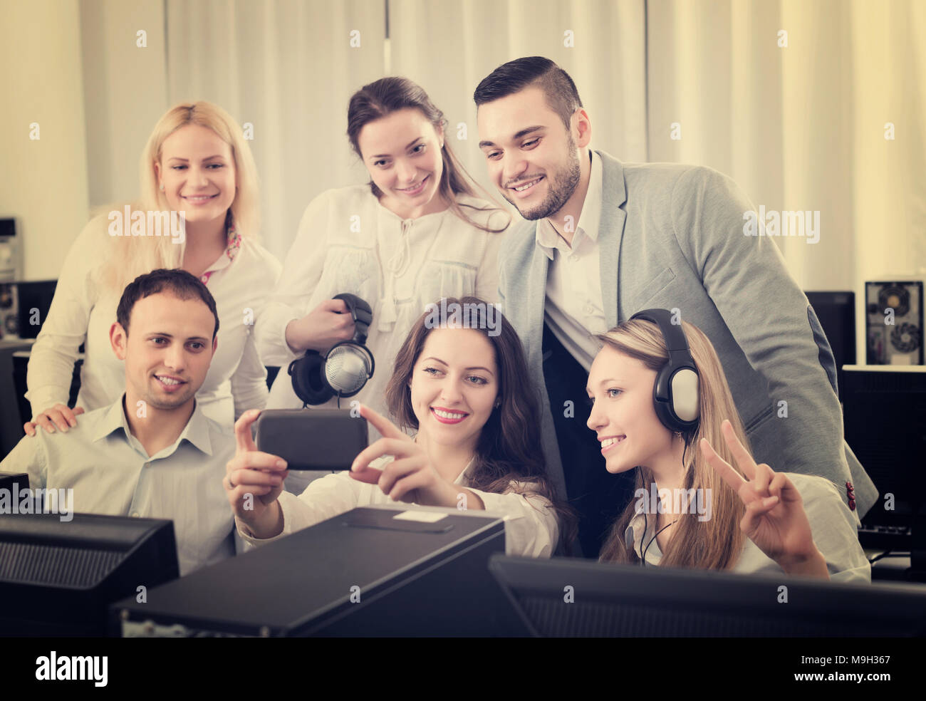 Successful business team making selfie with smartphone Stock Photo - Alamy
