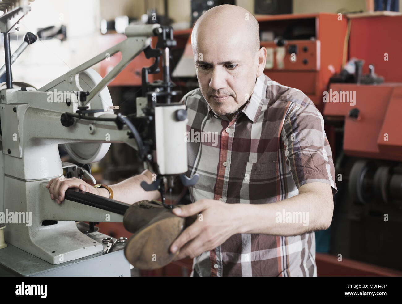 Machine stitching boots hi-res stock photography and images - Alamy