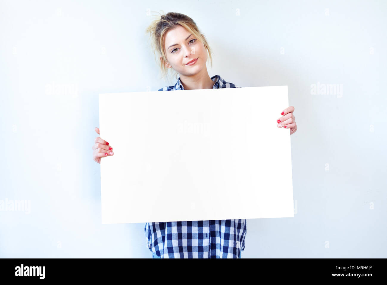 Girl Holding Blank Paper