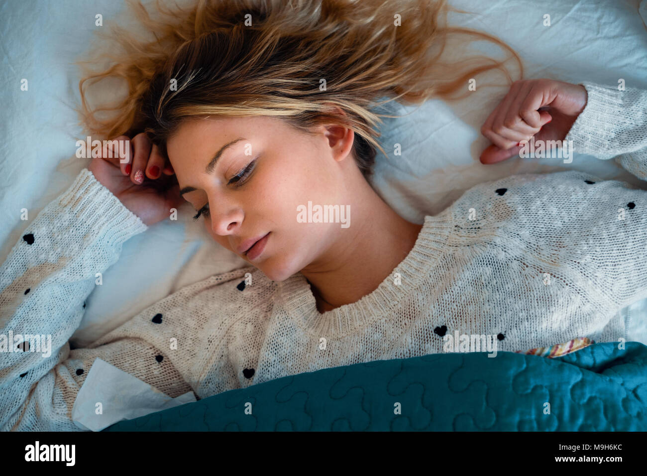 Attractive brunette girl sleeping on hi-res stock photography and ...
