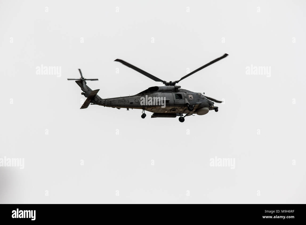 Athens, Greece. 25th Mar, 2018. A helicopter is seen flying over the ...