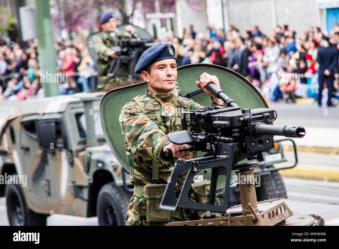 Athens, Greece. 25th Mar, 2018. A soldier is seen on an armored vehicle ...