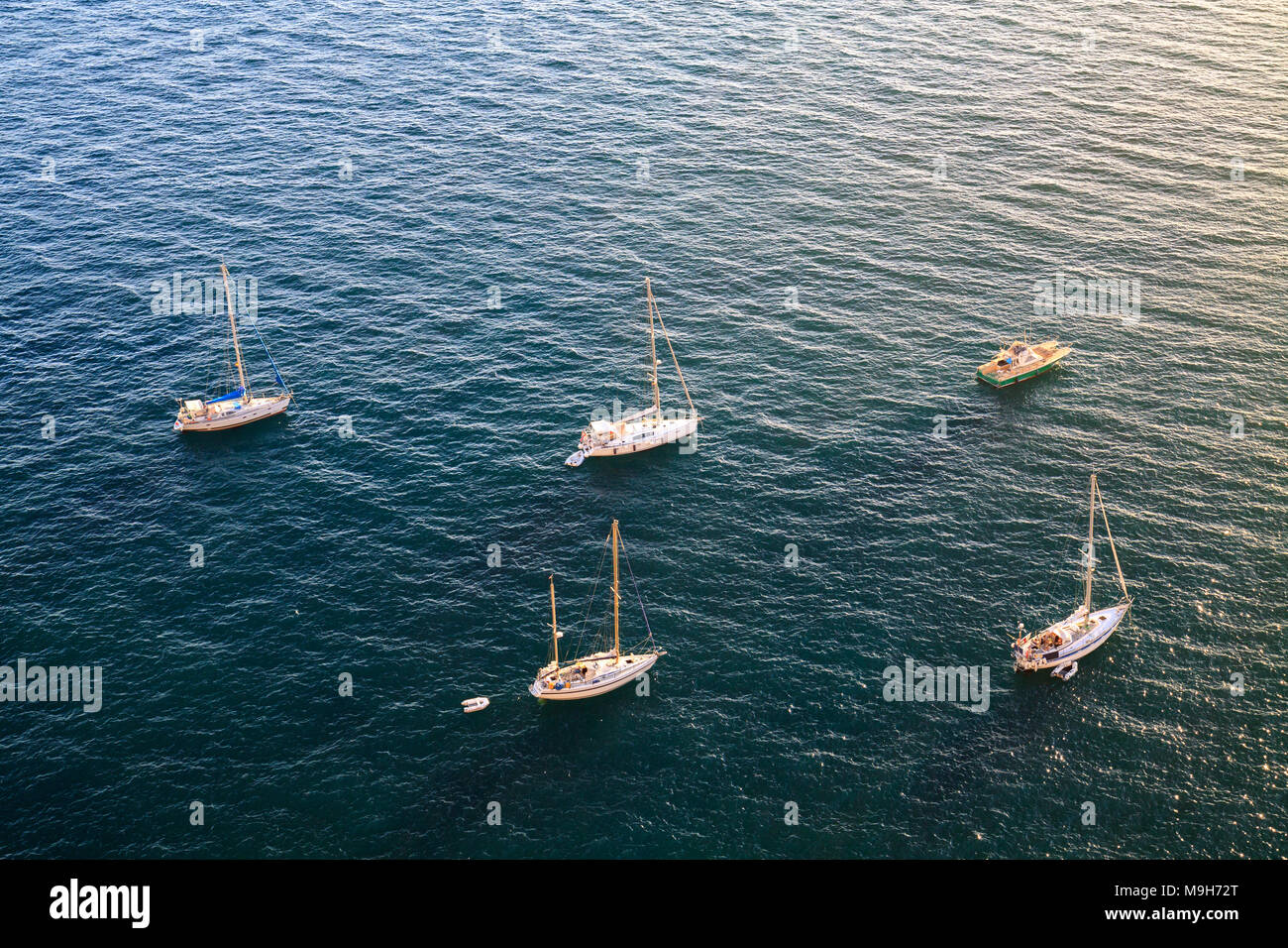 Few yachts are standing on the anchor, aerial view of sea surface Stock ...