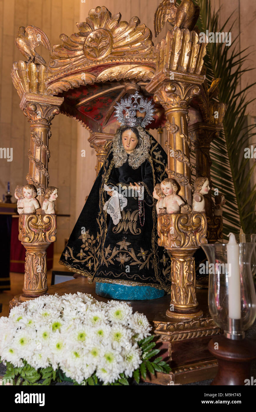 Small statues of Jesus Christ and the Virgin Mary, depicting various ...