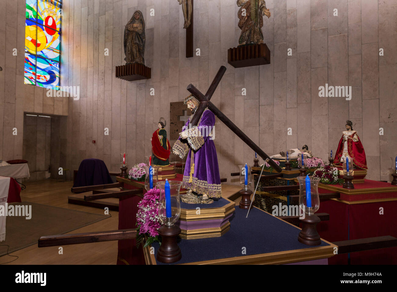 Small statues of Jesus Christ and the Virgin Mary, depicting various ...