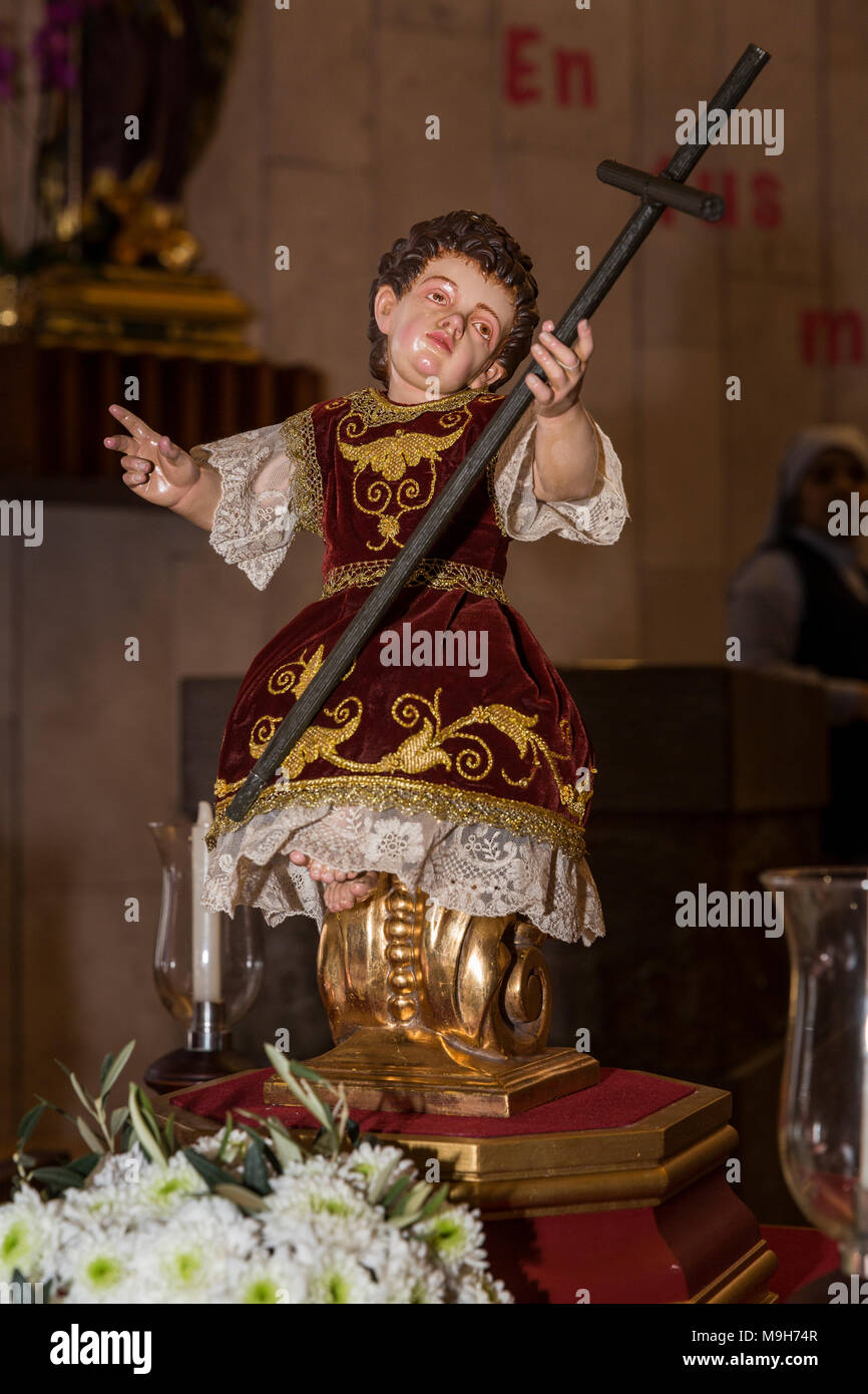 Small statues of Jesus Christ and the Virgin Mary, depicting various ...