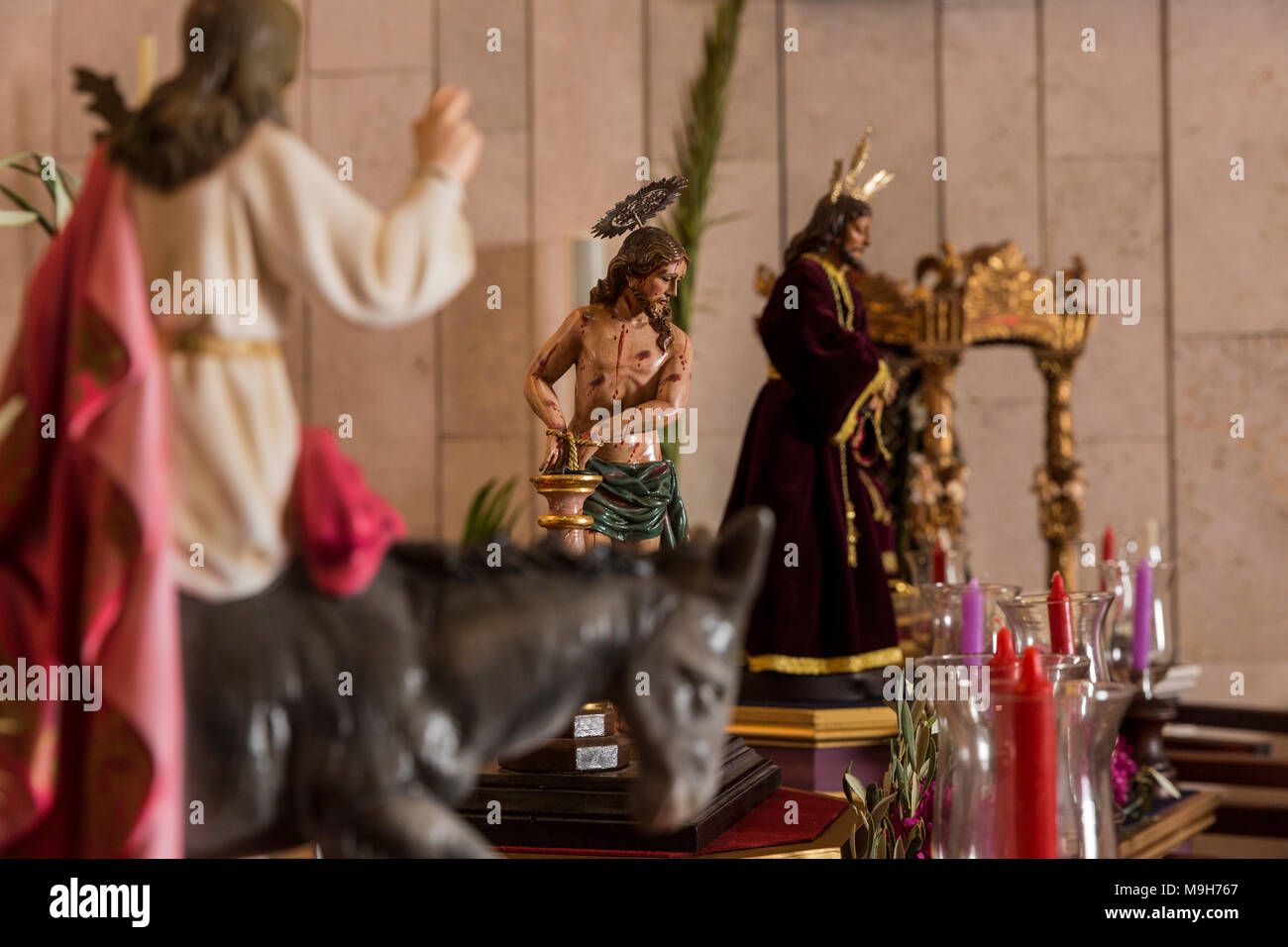 Small statues of Jesus Christ and the Virgin Mary, depicting various ...