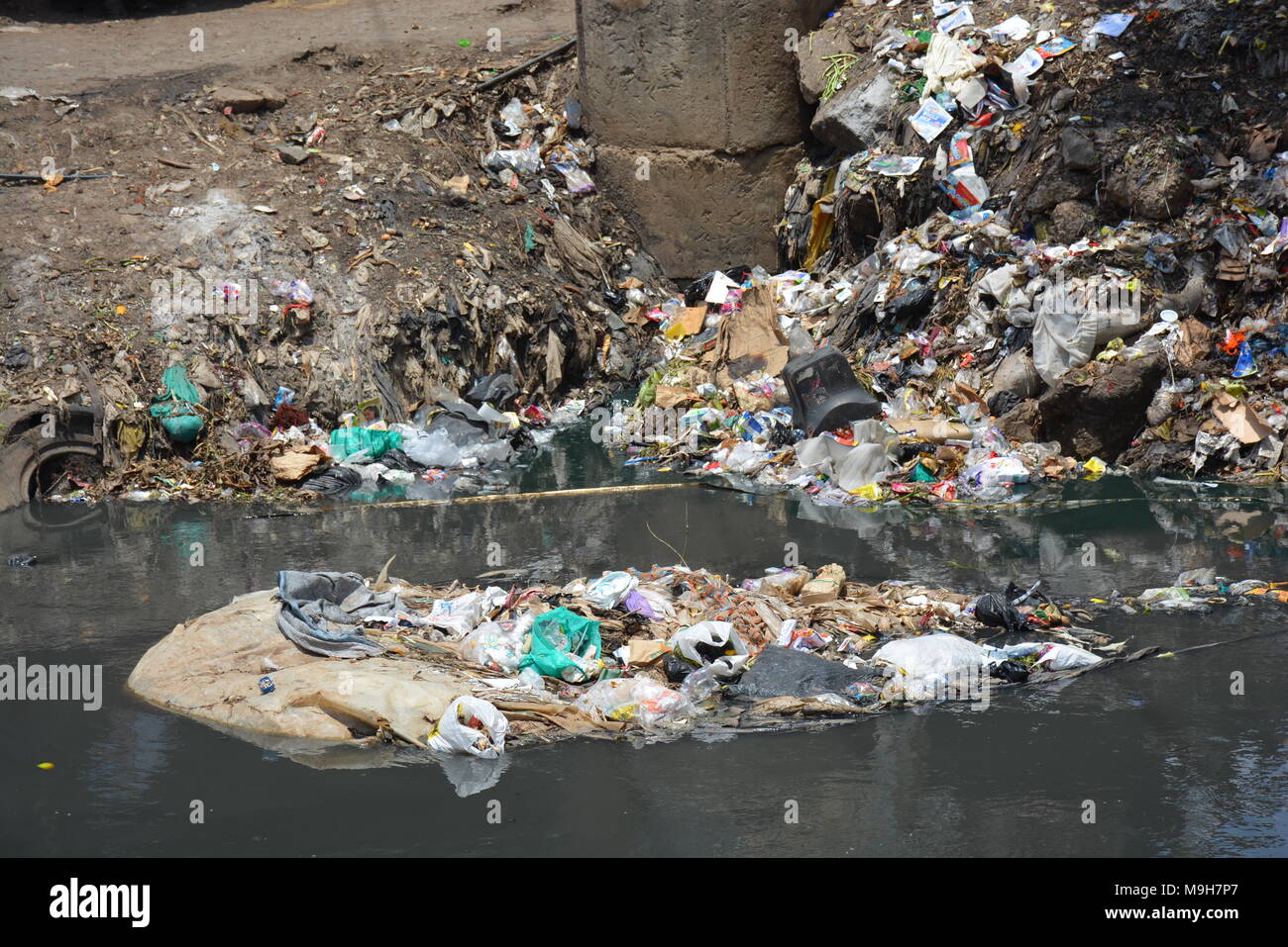 Illegal solid waste dumping causing pollution to the environment Stock ...