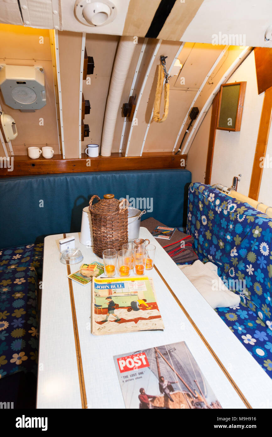 Inside accommodation cabin / room with mess table, seats, bunks, etc ...