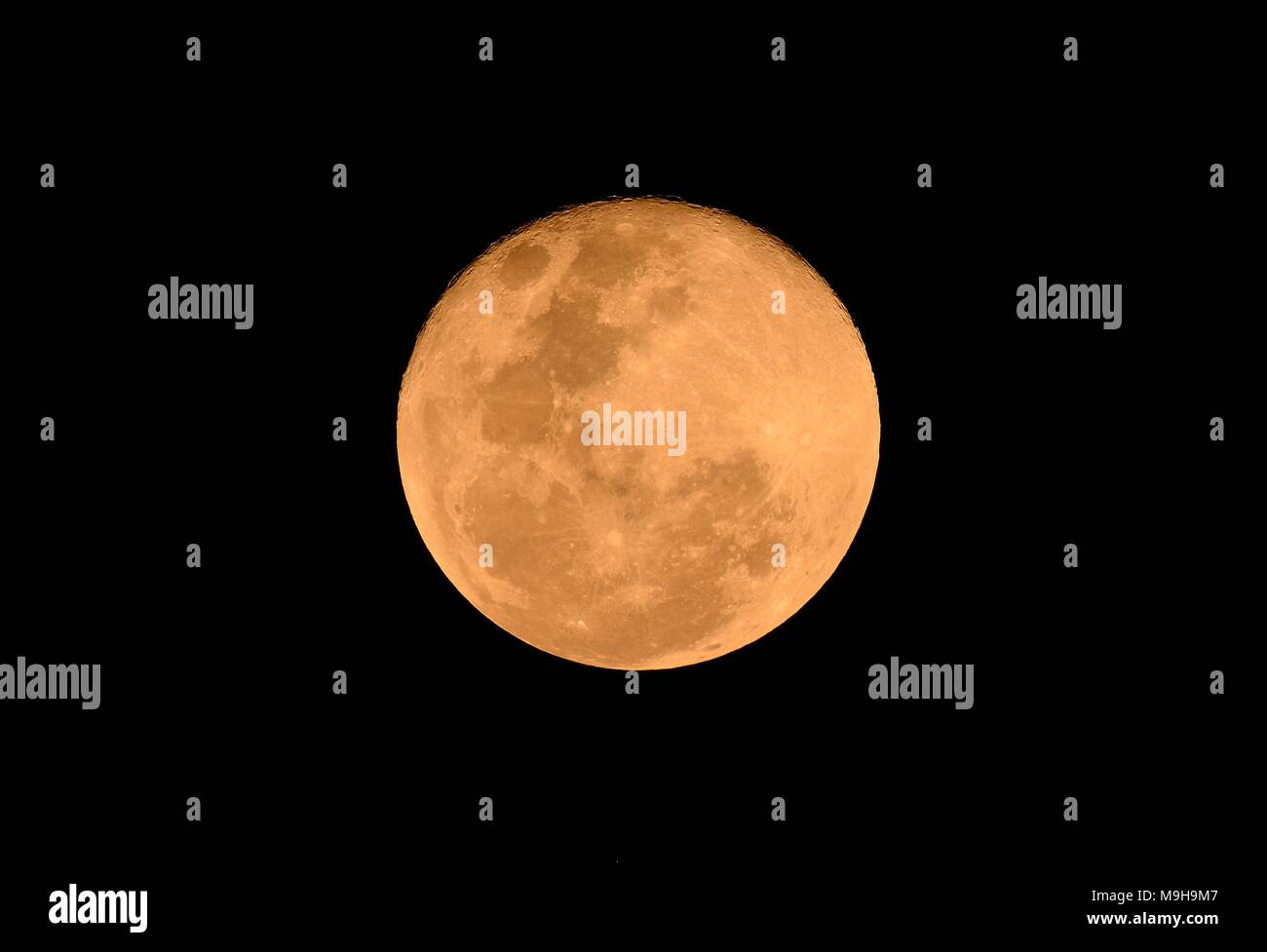 Night sky with full beautiful orange moon Stock Photo - Alamy