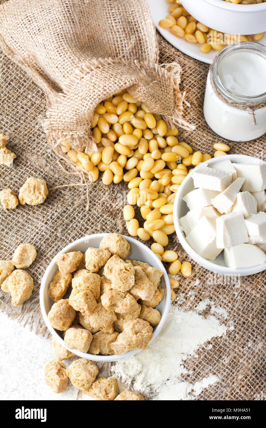 Ecological texturized soy meat with dry soy beans and tofu on rustic ...