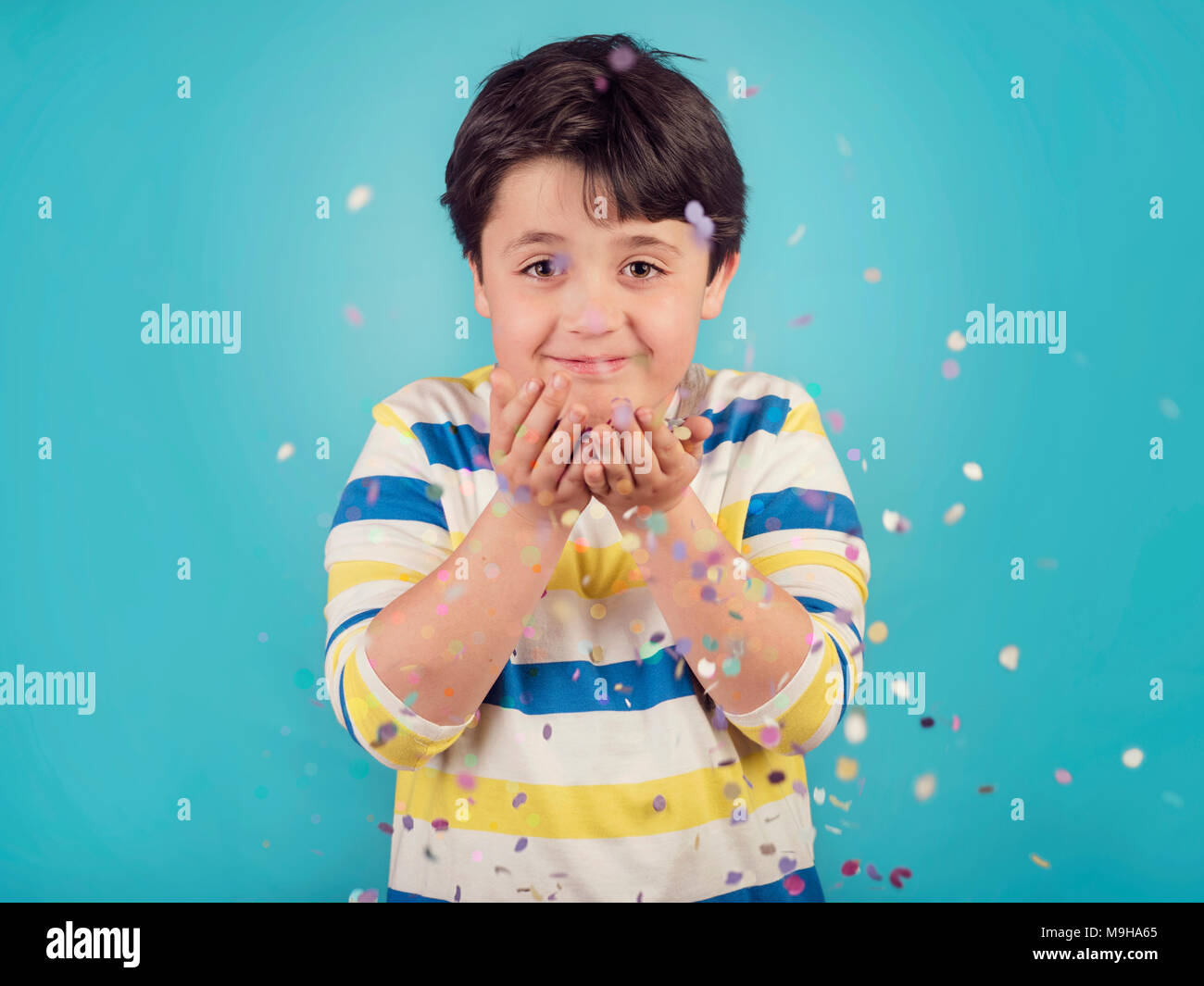 smiling boy with confetti Stock Photo - Alamy smiling boy with confetti Stock Photo - Alamy