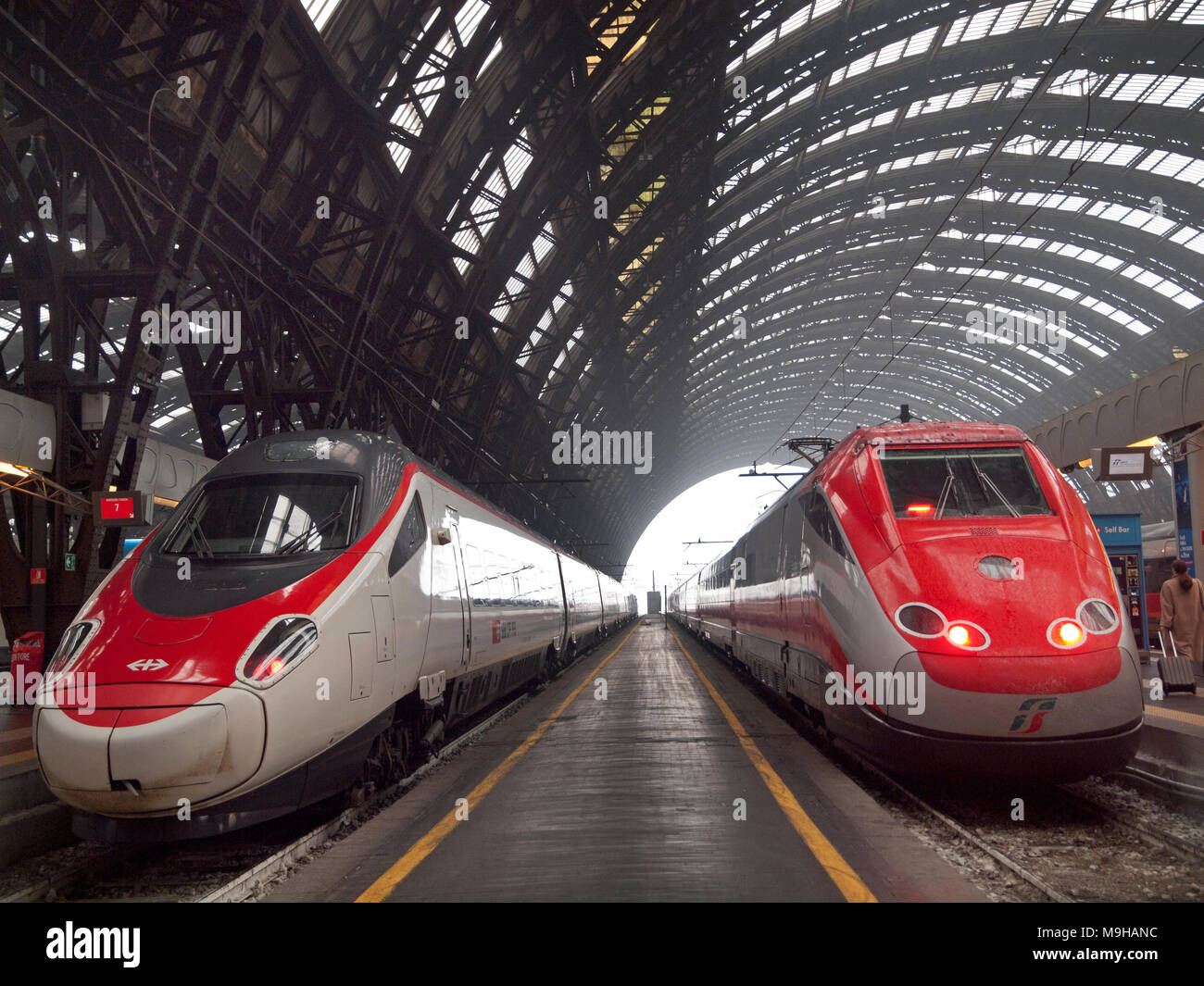 Trains wait in Milan Central railway station Stock Photo - Alamy
