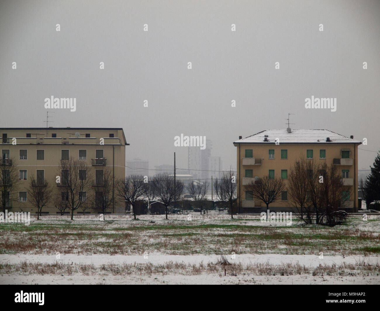 A cold, frozen Italian landscape, as seen from a train traveling ...