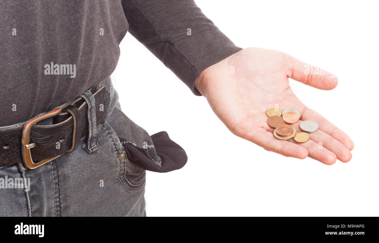 poor man hand holding coins and empty pocket Stock Photo - Alamy