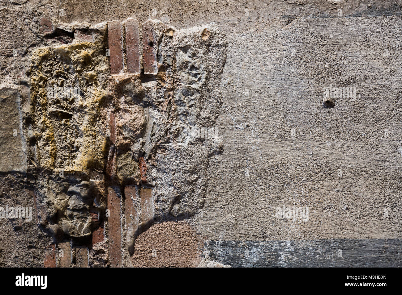 Old damaged stone wall surface texture Stock Photo - Alamy
