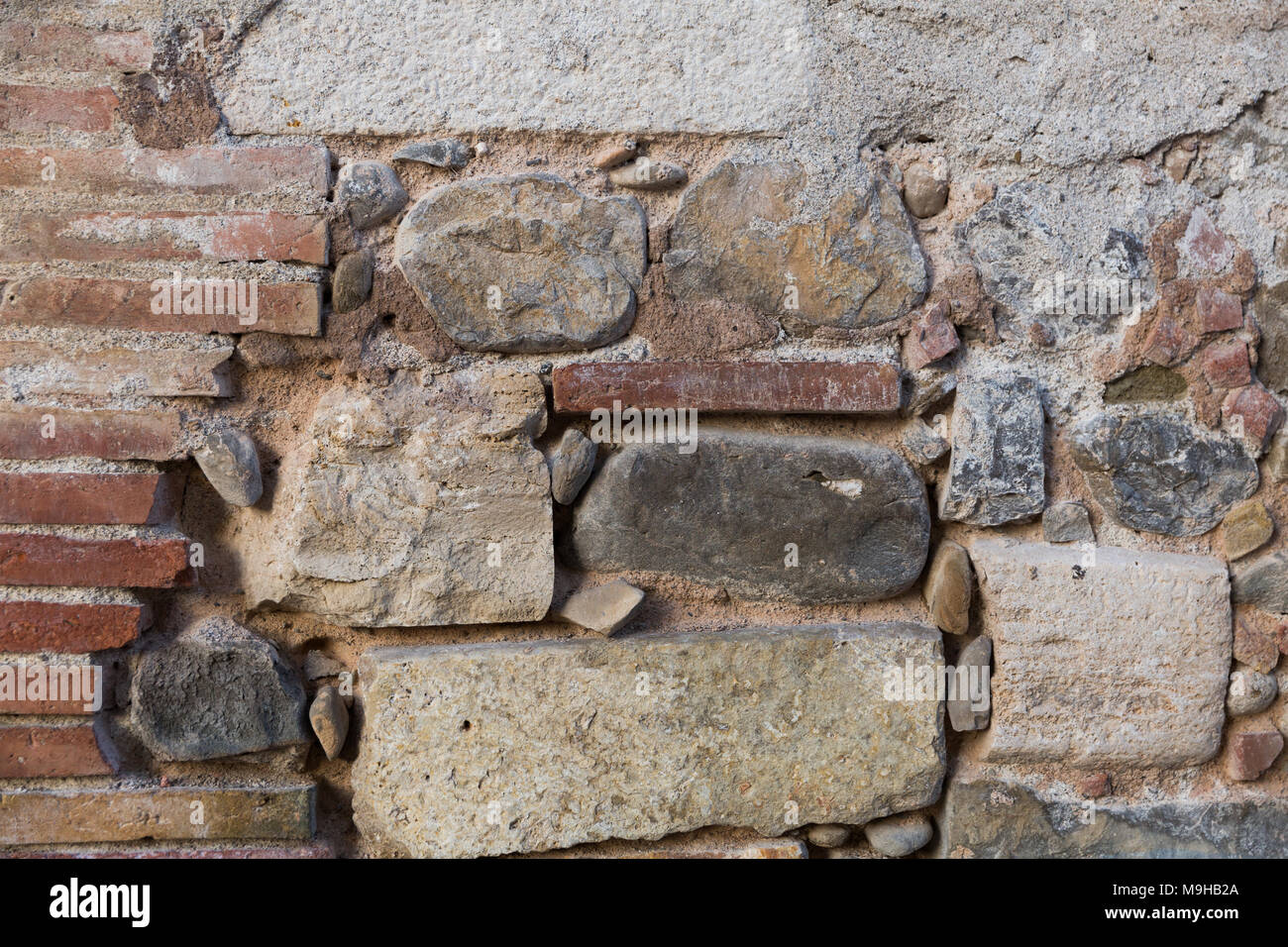 Old damaged stone wall surface texture Stock Photo - Alamy