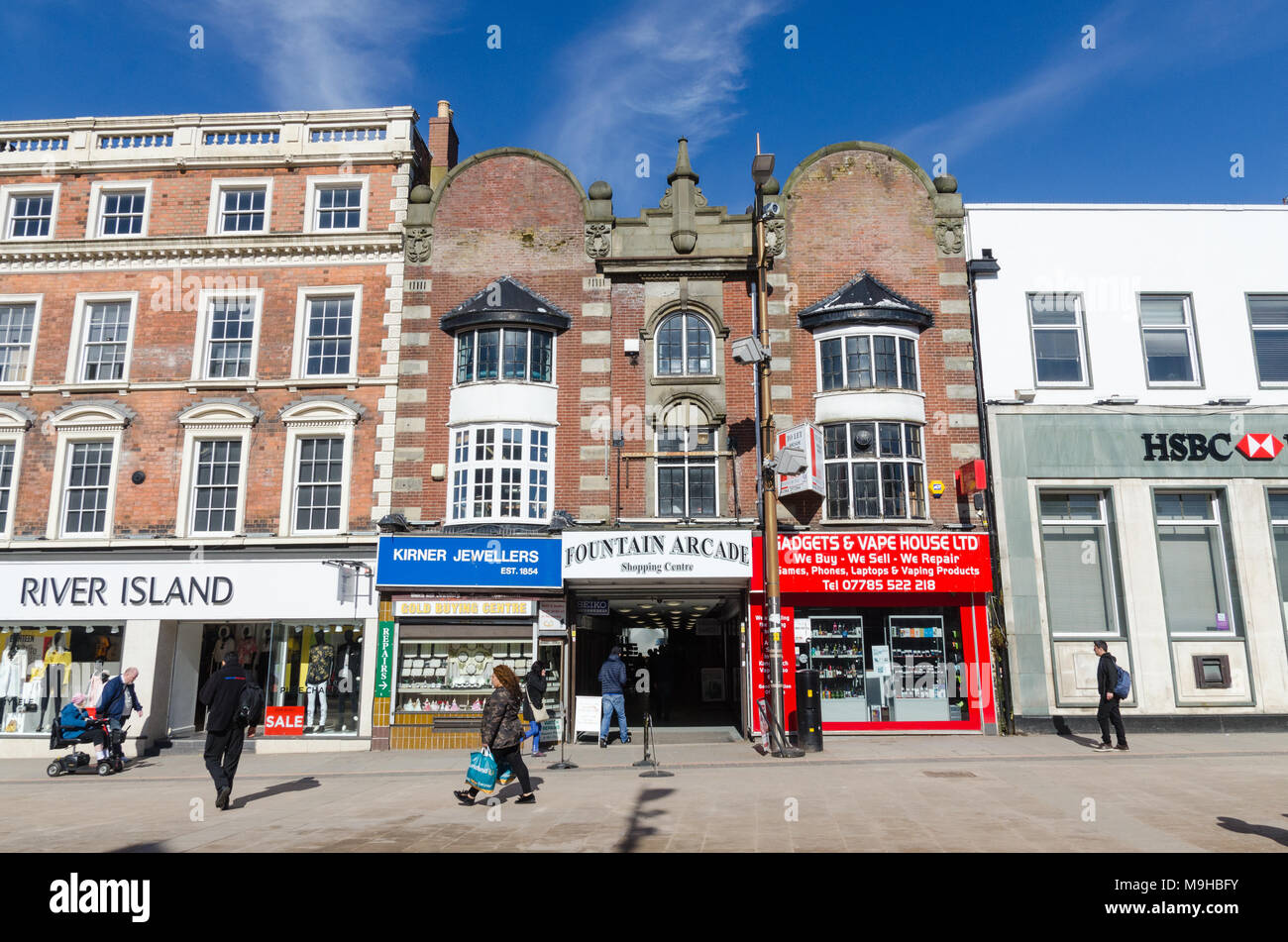 Shops and shoppers in Market Place, Dudley, West Midlands Stock Photo ...