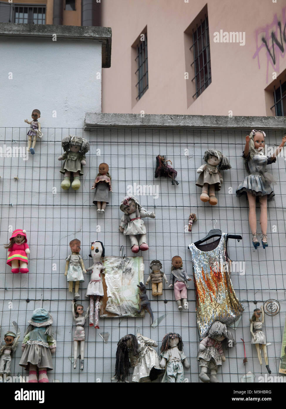 The Wall of Dolls in Milan, a public art installation symbolizing ...