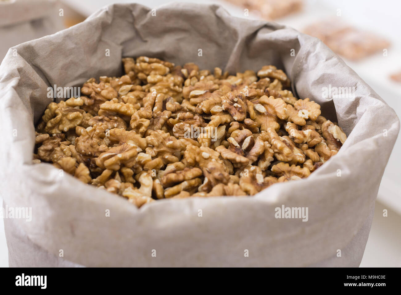 Illustration of bag with walnut in the shop Stock Photo - Alamy