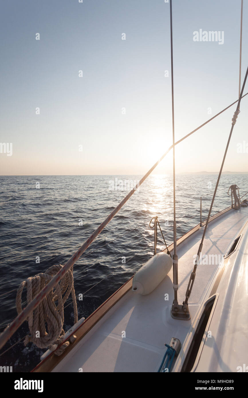 Sunset view from a boat sailing in a sea Stock Photo - Alamy