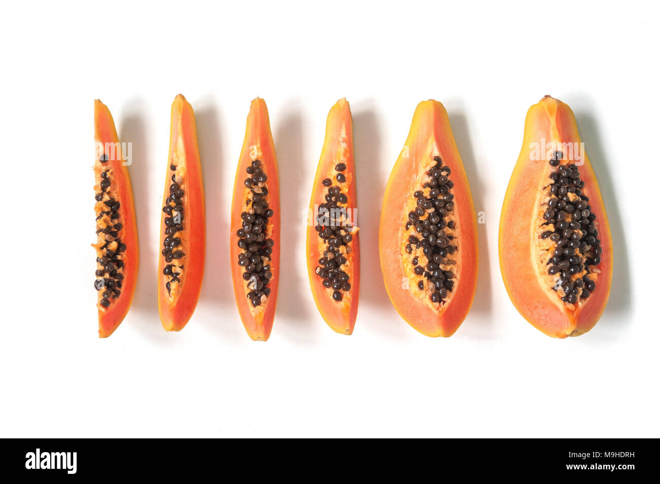 slices of ripe papaya on white background. Isolate. Exotic fruit Stock ...