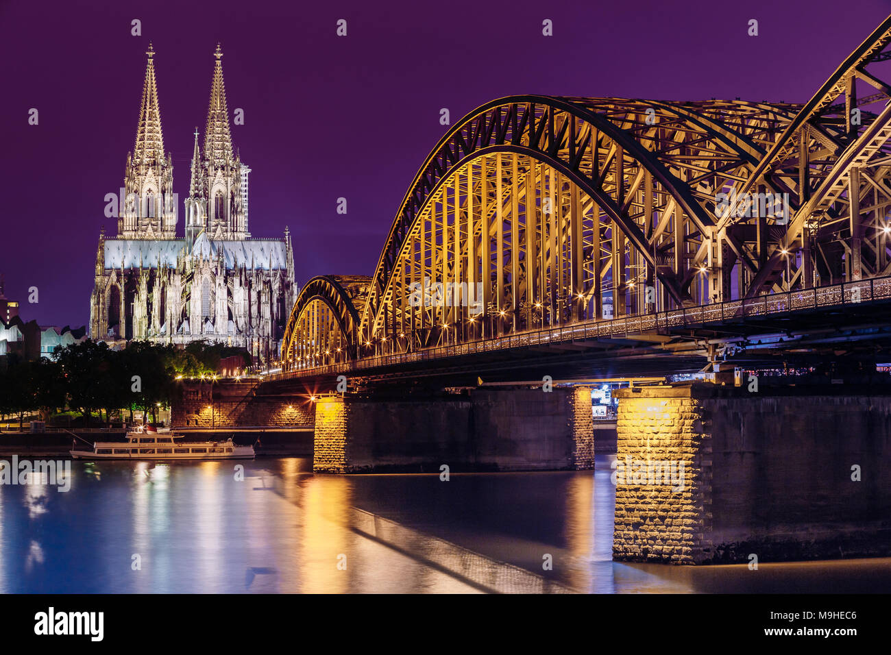 Cologne, Germany. Night View Of Cologne Cathedral And Hohenzollern ...