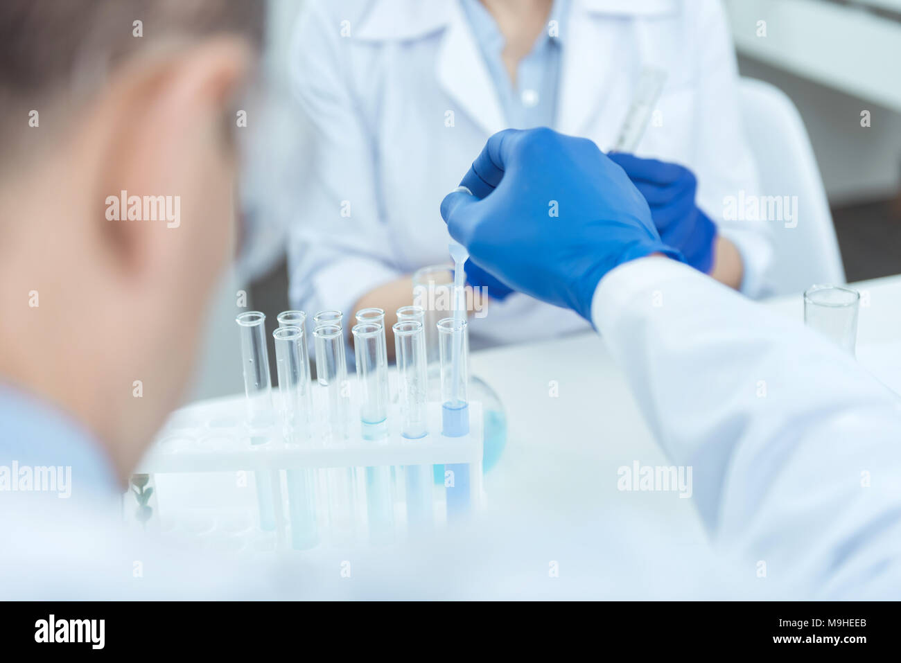 Scientist conducting an experiment hi-res stock photography and images ...