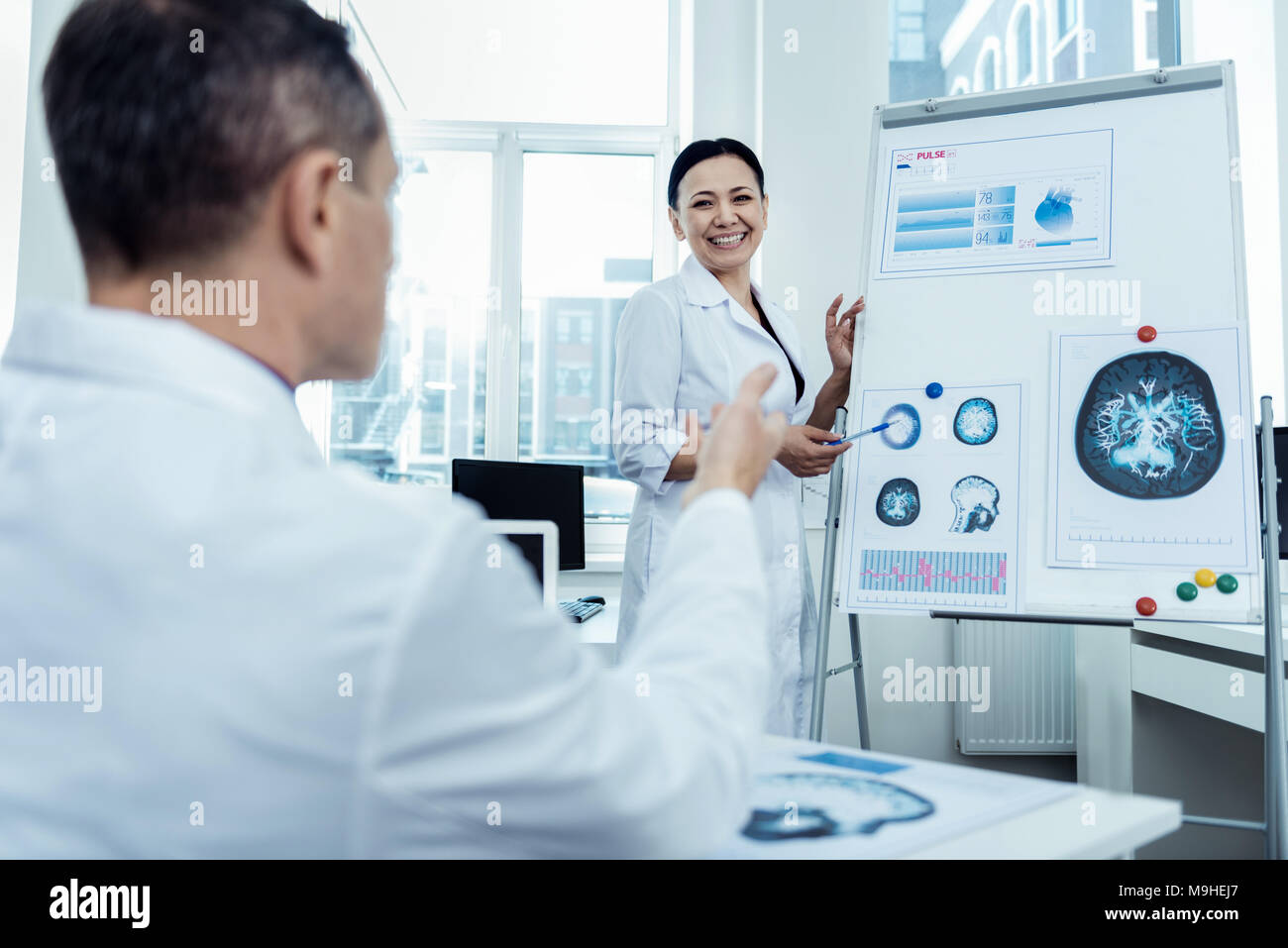 Professional female neurologist making a presentation Stock Photo - Alamy