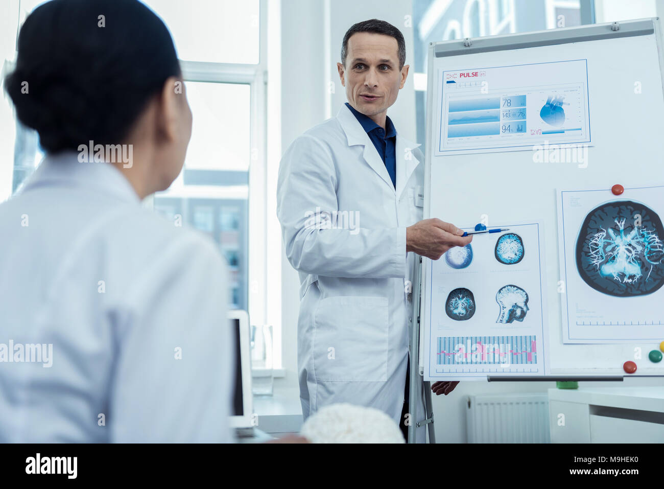 Professional male researcher presenting his research Stock Photo - Alamy