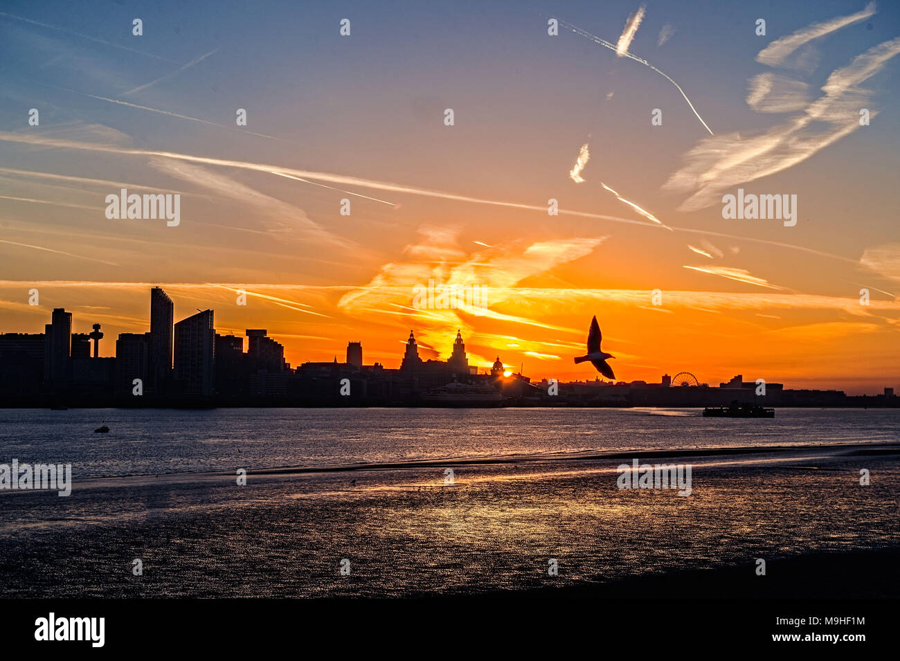 Beautiful sunrise over Liverpool's magnificent waterfront on a freezing ...