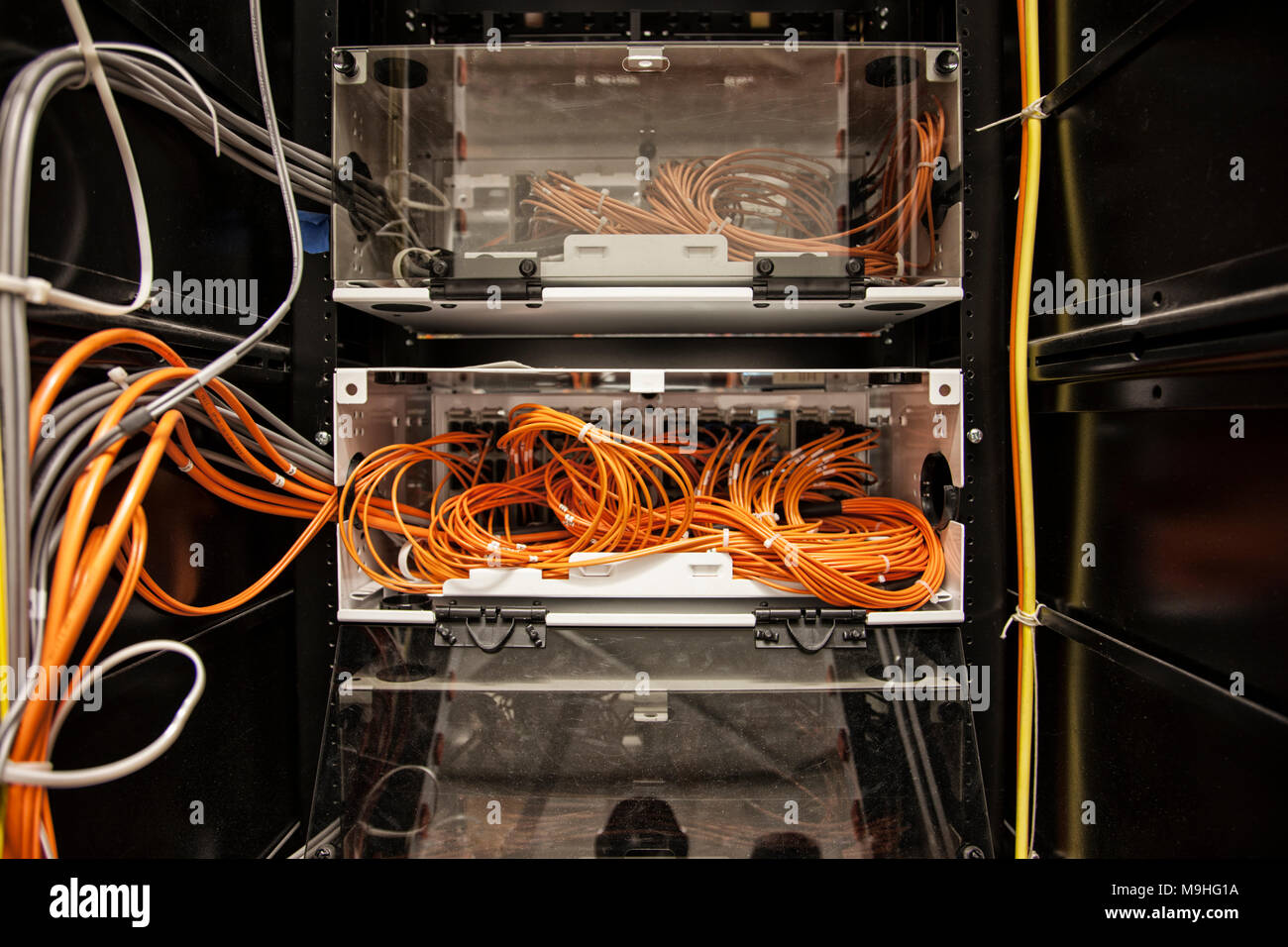 Closeup of CAT 5 cable bundle system in a computer server room Stock ...