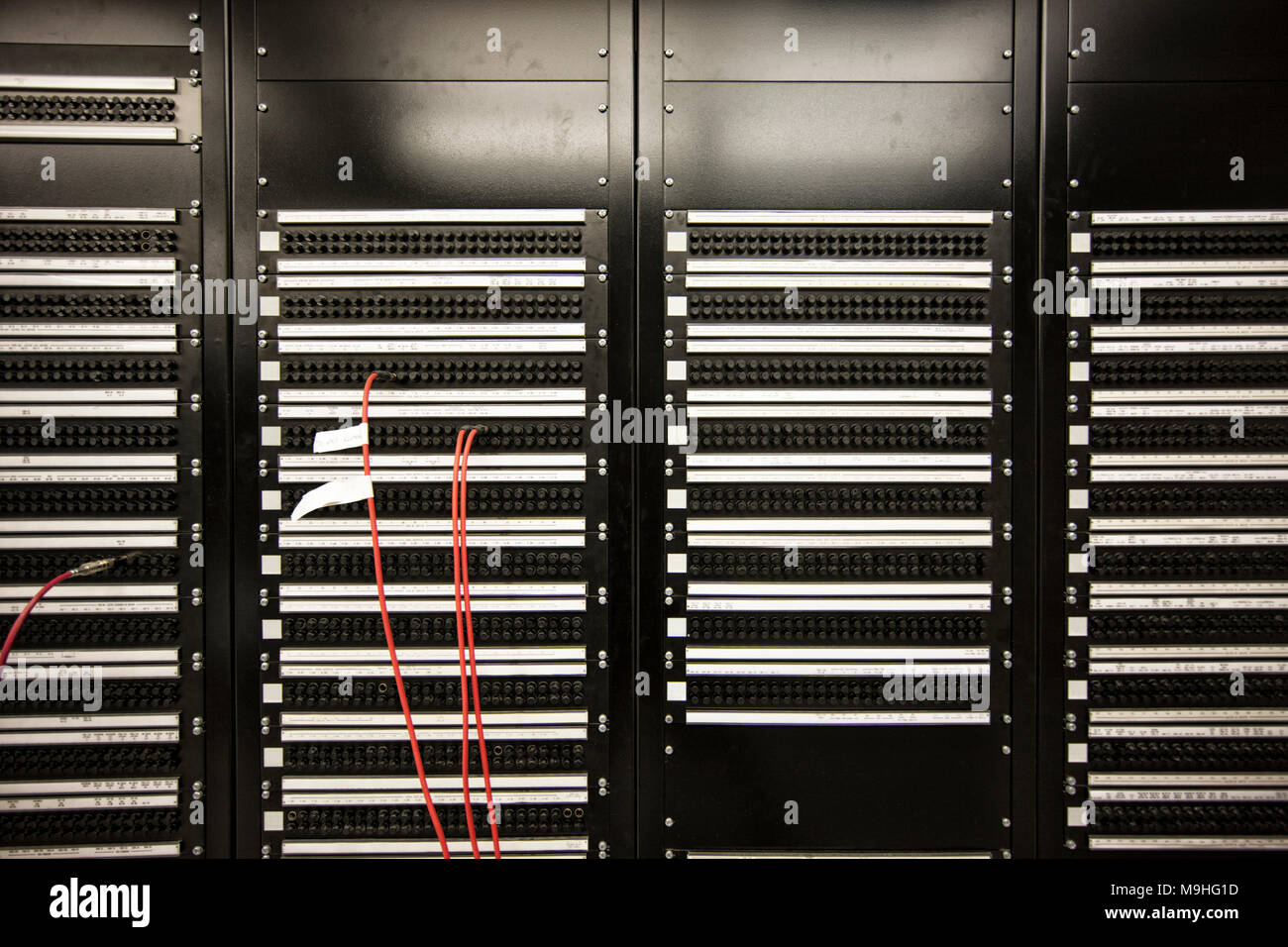 Storage racks aligned in a computer server room Stock Photo - Alamy
