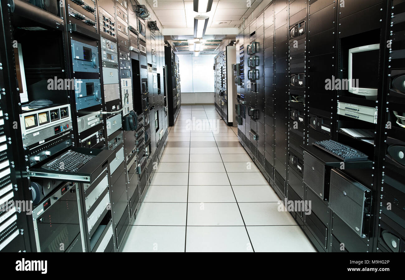Storage racks aligned in a computer server room Stock Photo - Alamy