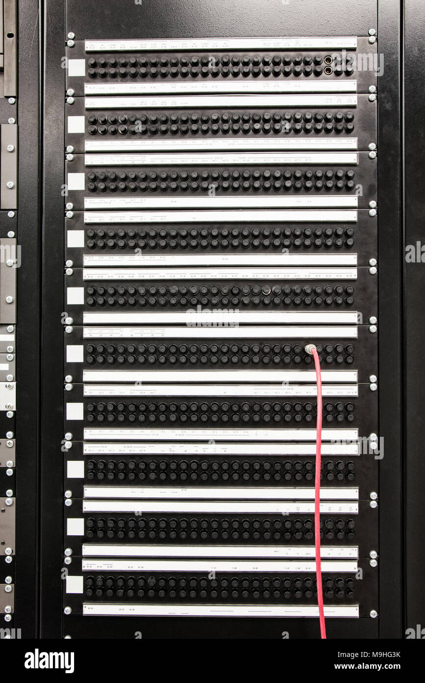 Rack of servers and a CAT 5 cable in a server room Stock Photo - Alamy