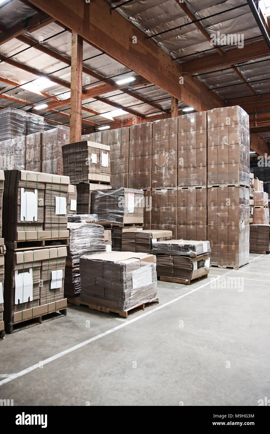 Warehouse interior showing stacks of cardboard used for packaging Stock ...