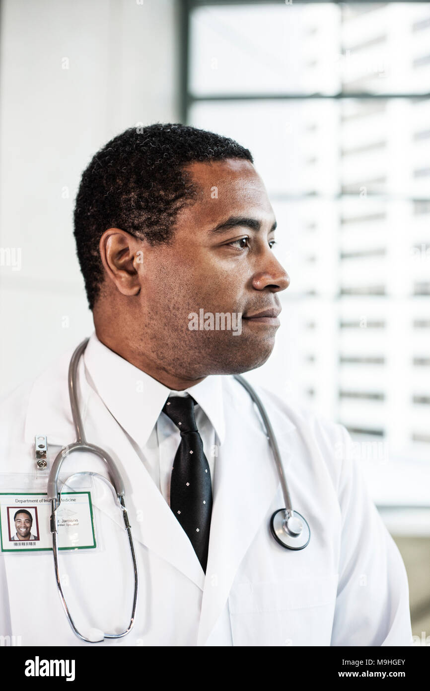 Doctor in black tie stethoscope hi-res stock photography and images - Alamy