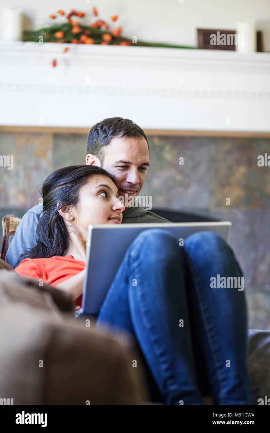 Man sitting on the lap of a woman hi-res stock photography and images ...
