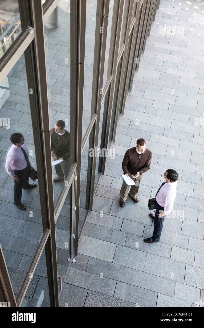 People talking outside bank building hi-res stock photography and ...