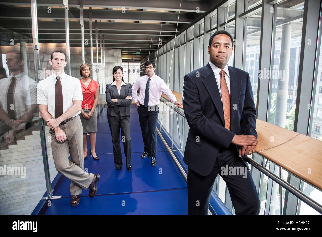 A team of men and women, an ethnically diverse team of business people ...