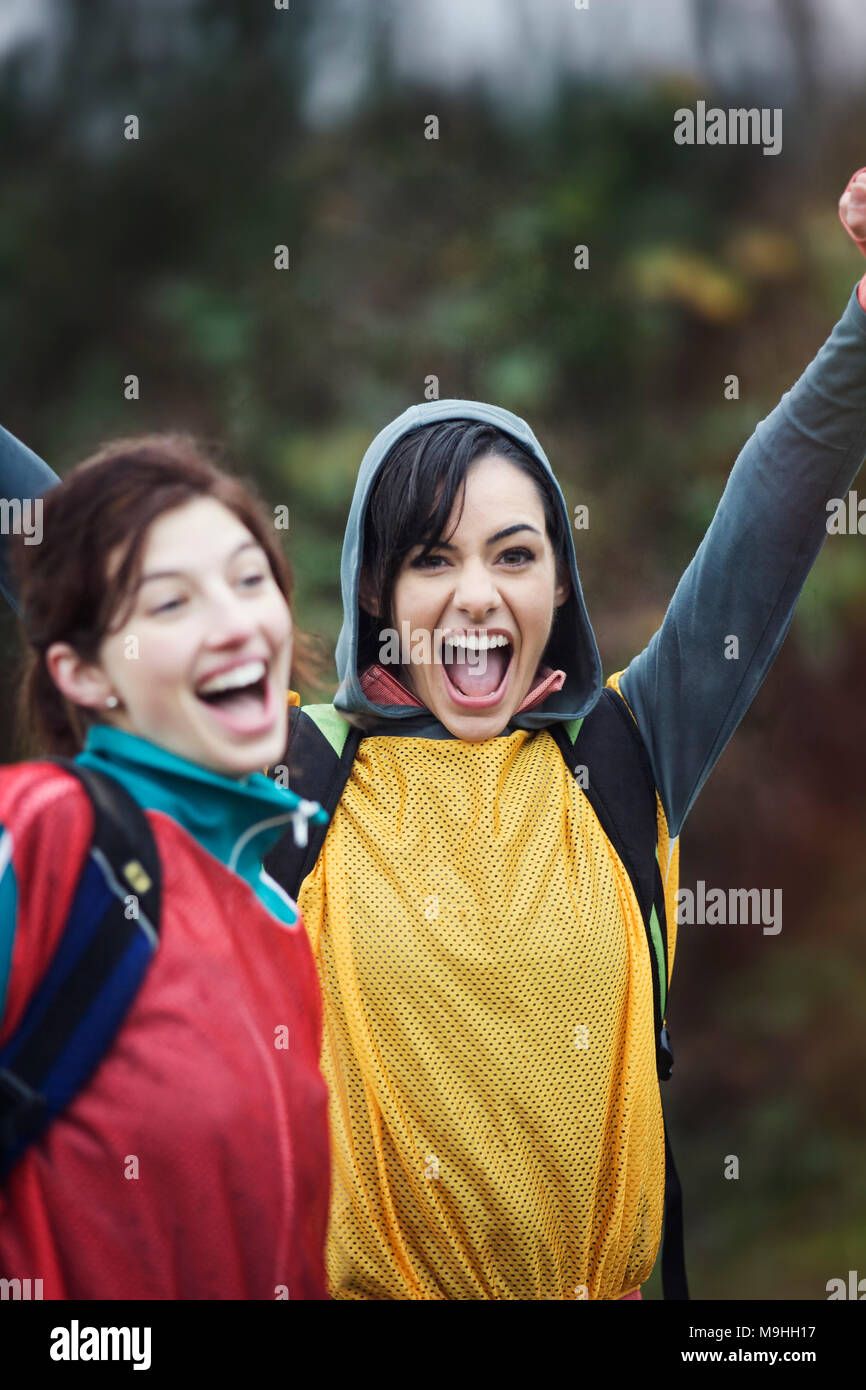Two women cheering at an informal outdoor sporting event Stock Photo ...