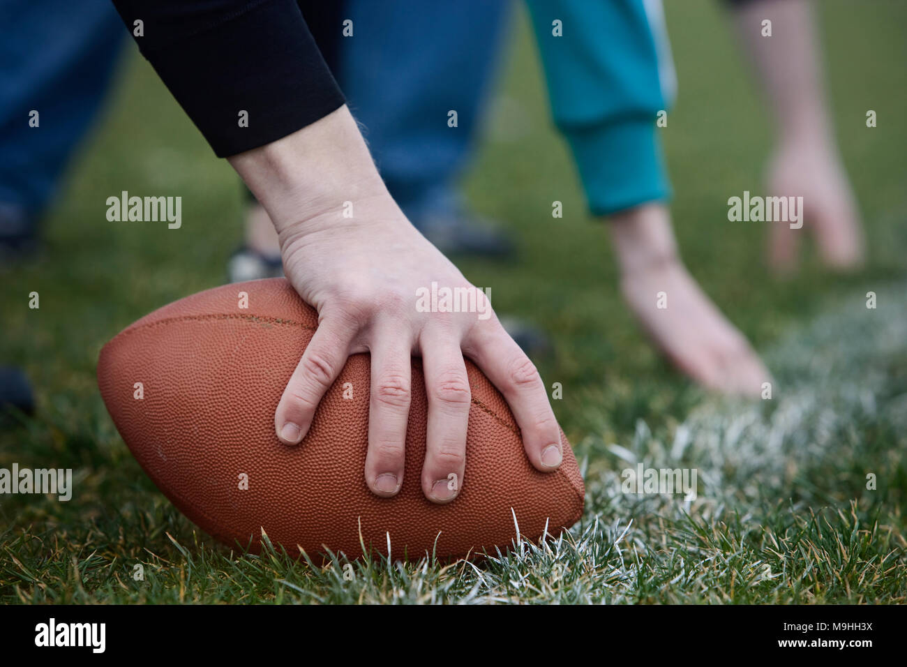 American football player holding flag hi-res stock photography and ...