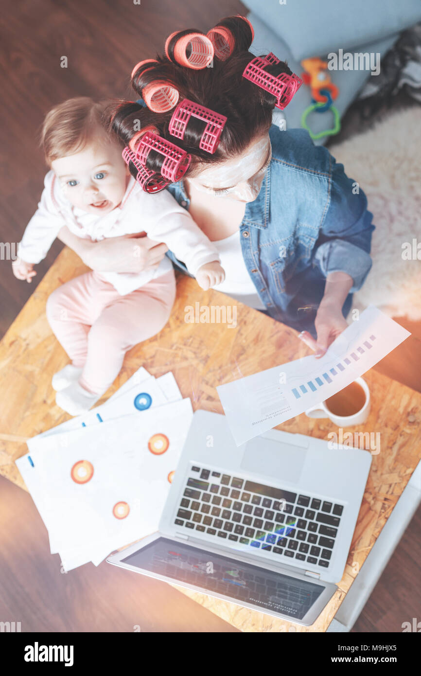 Top view of a nice caring mother being with her child Stock Photo - Alamy