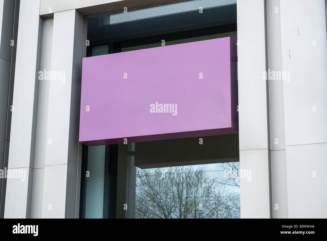 Purple Empty blank sign in front of the store Stock Photo - Alamy