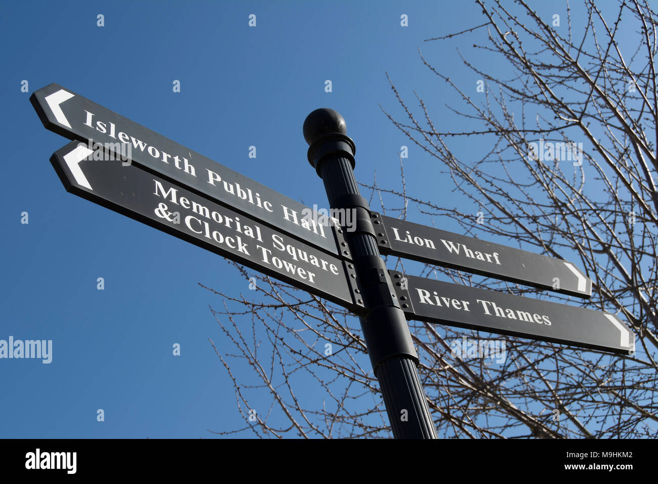 direction signpost in isleworth, middlesex, england with routes to ...