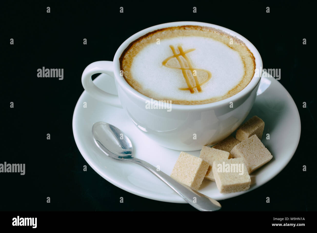 Dollar sign drawing on latte art coffee cup,business coffee Stock Photo ...