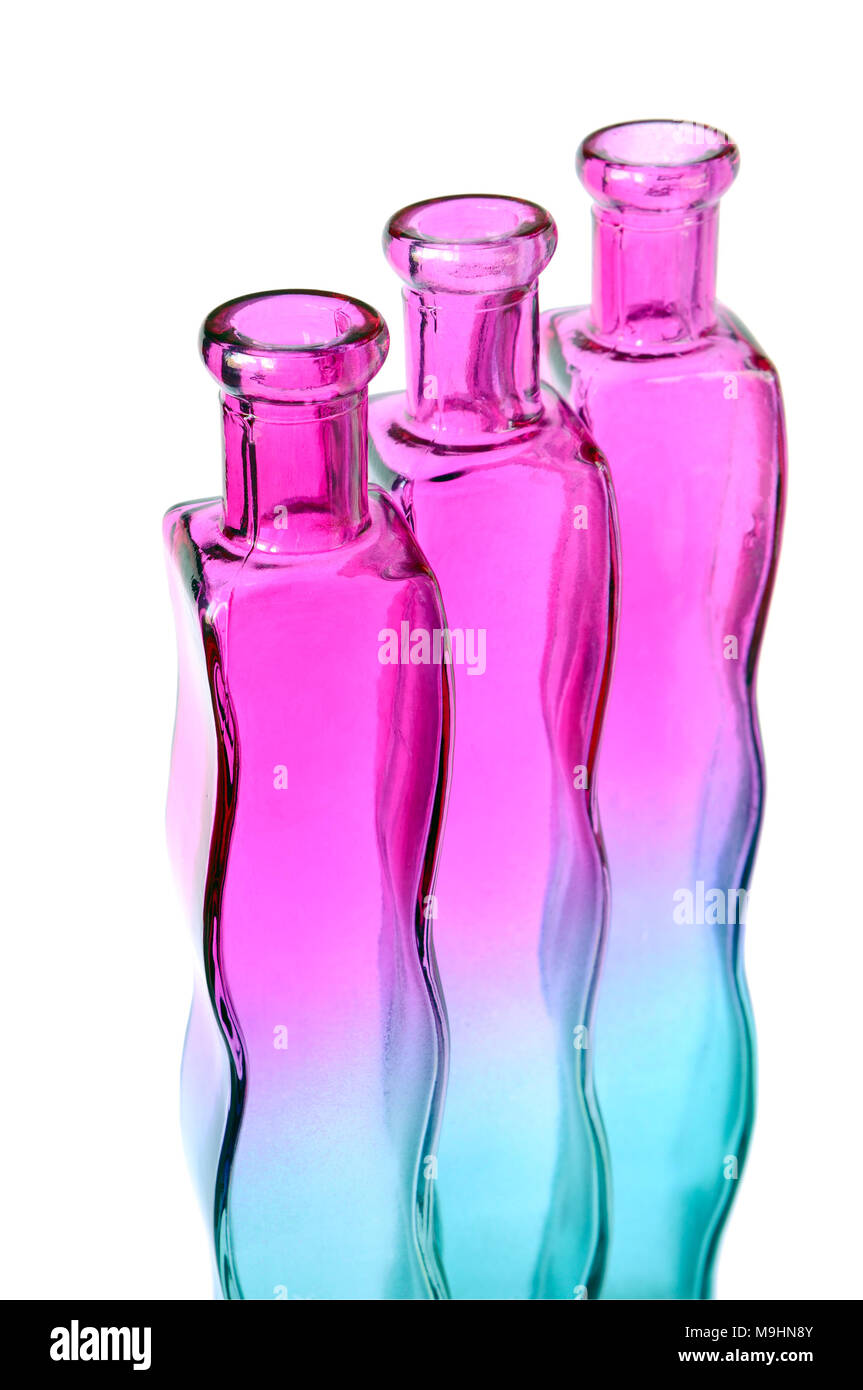 Three glass vases on a white background Stock Photo - Alamy