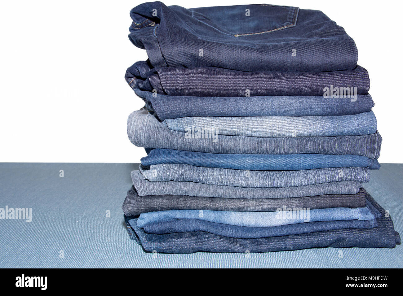 Pile of jeans ready for recycling Stock Photo - Alamy
